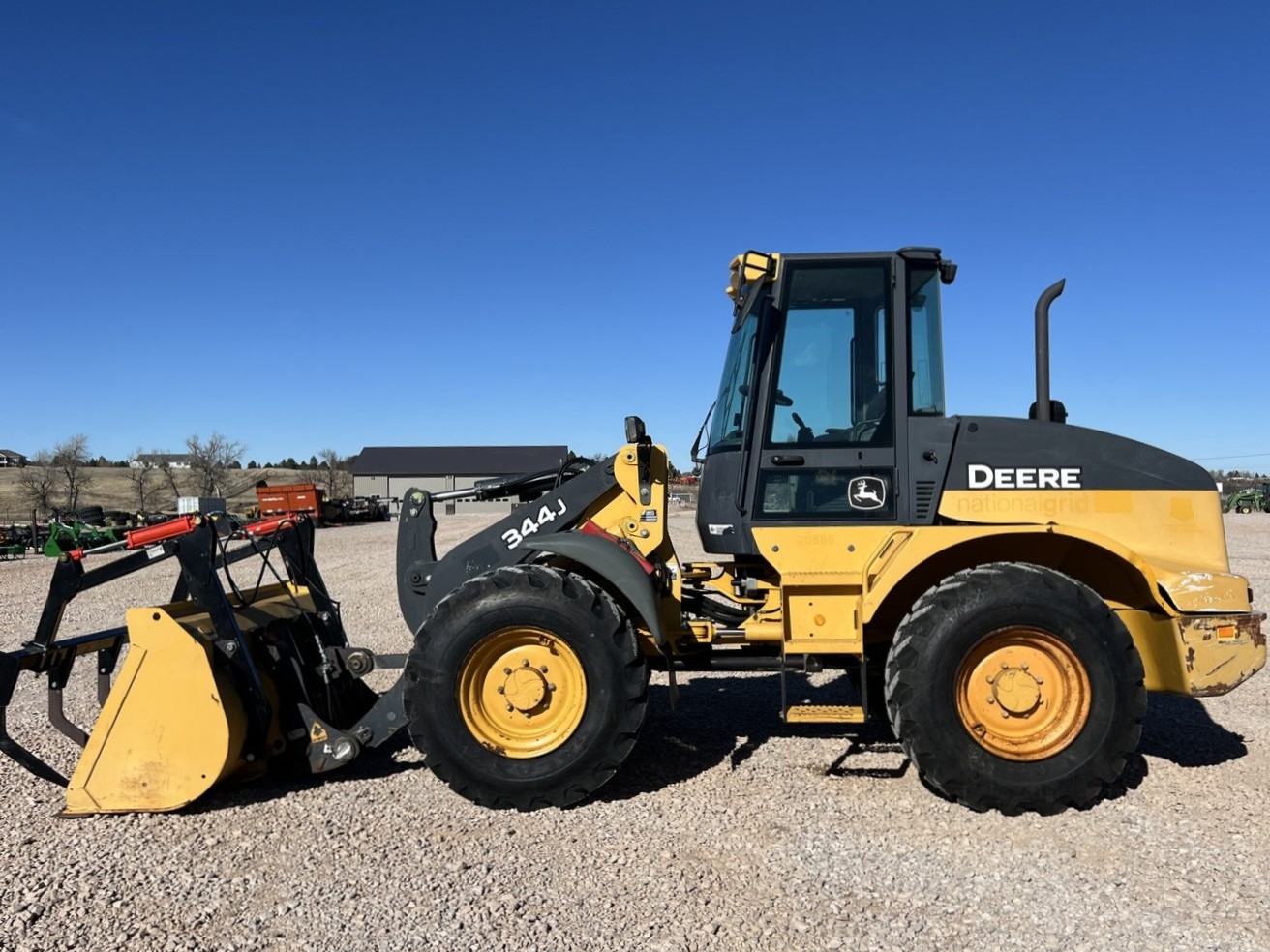 Lot 3794 - '11 Deere 344J Wheel Loader w/Grapple. Onsite-Belle Fourche ...