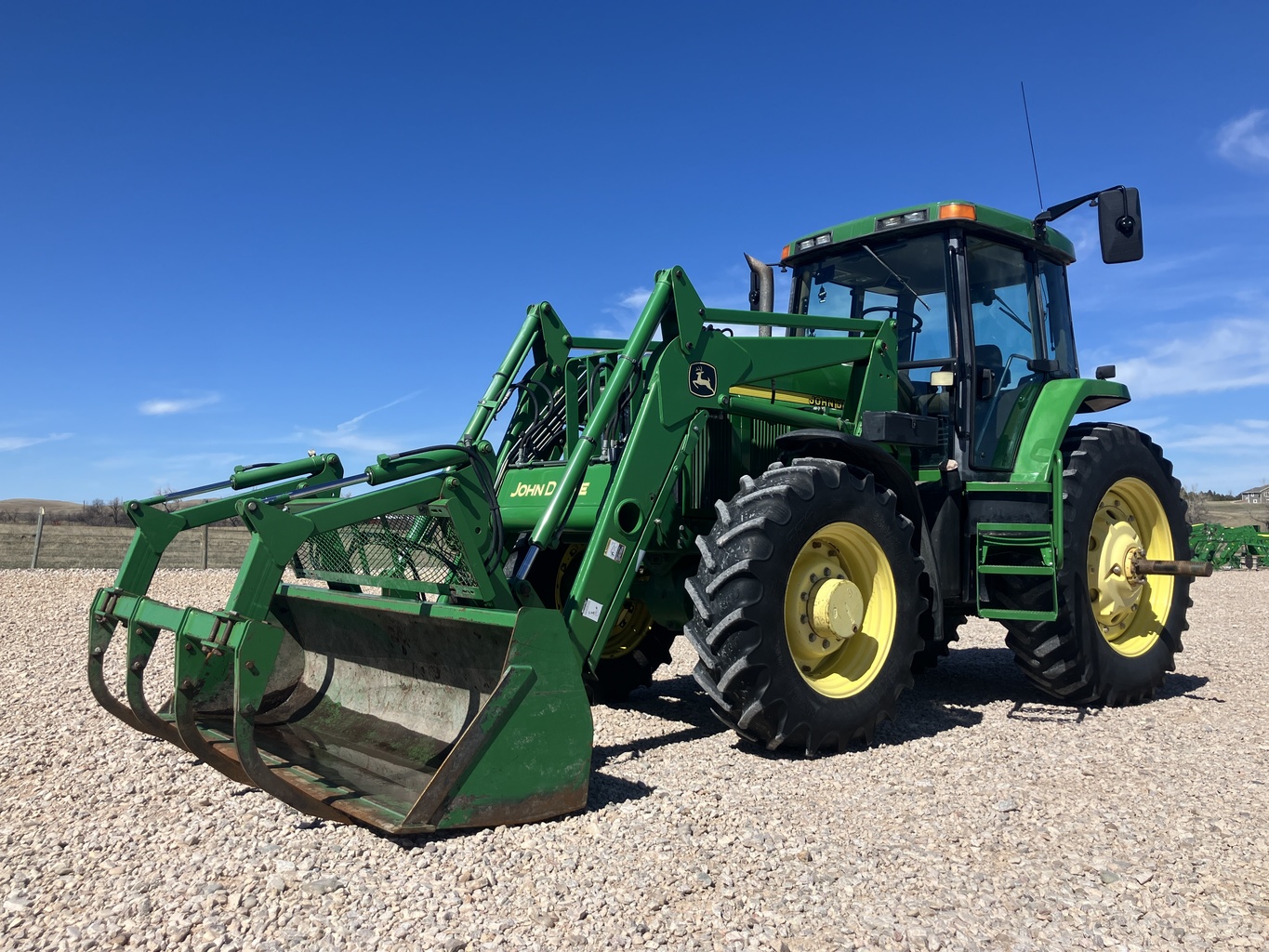 Lot 3913 - '97 JD 7810 MFWD PS w/JD 740 SL Loader. Onsite-Belle Fourche ...