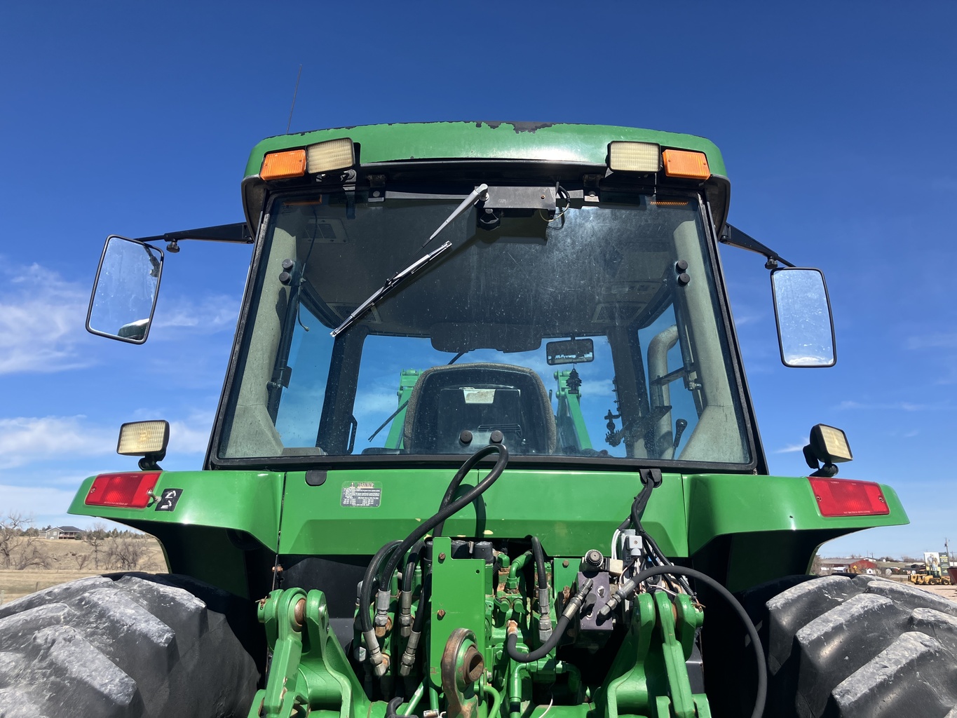 Lot 3913 - '97 JD 7810 MFWD PS w/JD 740 SL Loader. Onsite-Belle Fourche ...