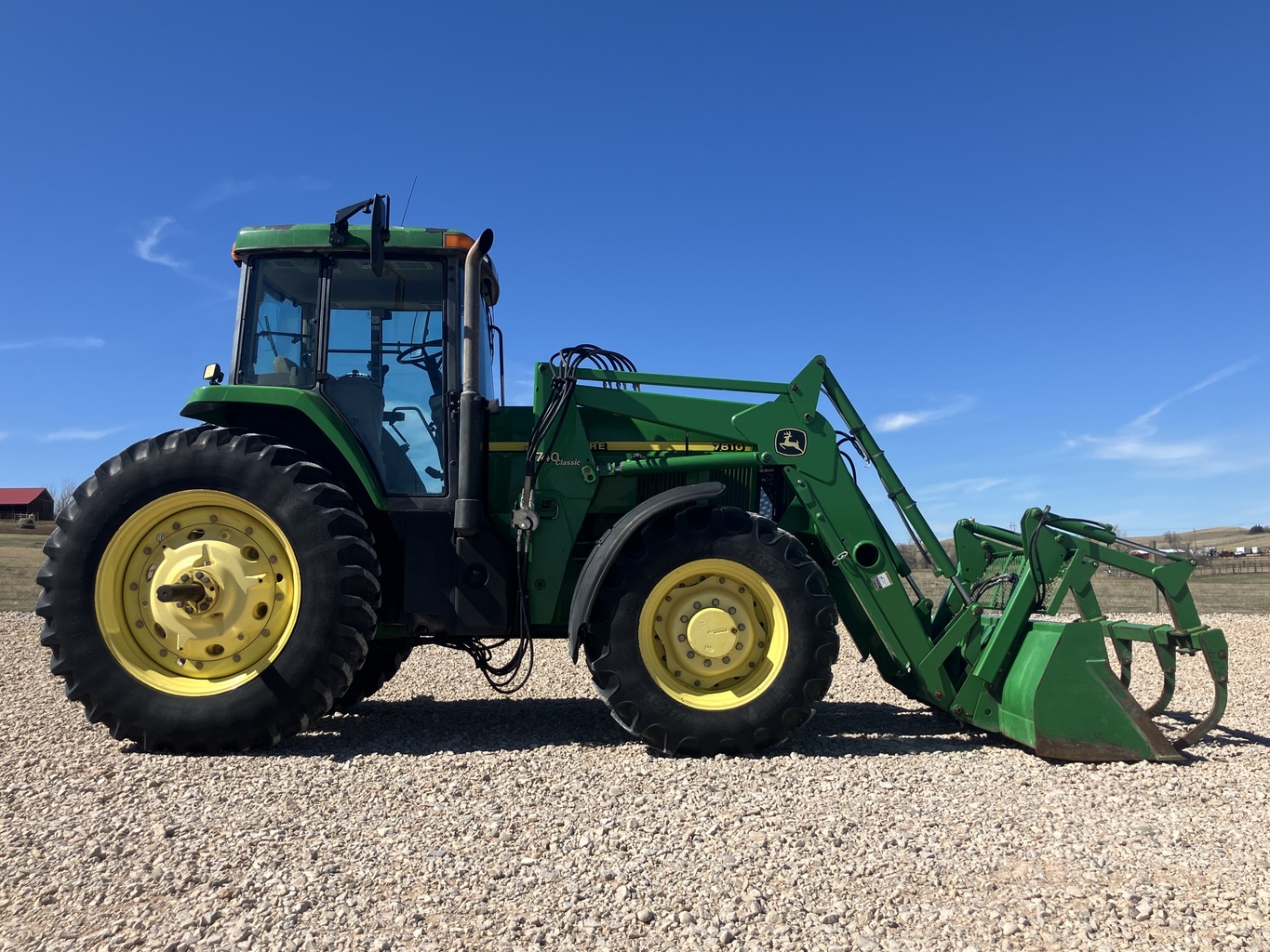 Lot 3913 - '97 JD 7810 MFWD PS w/JD 740 SL Loader. Onsite-Belle Fourche ...