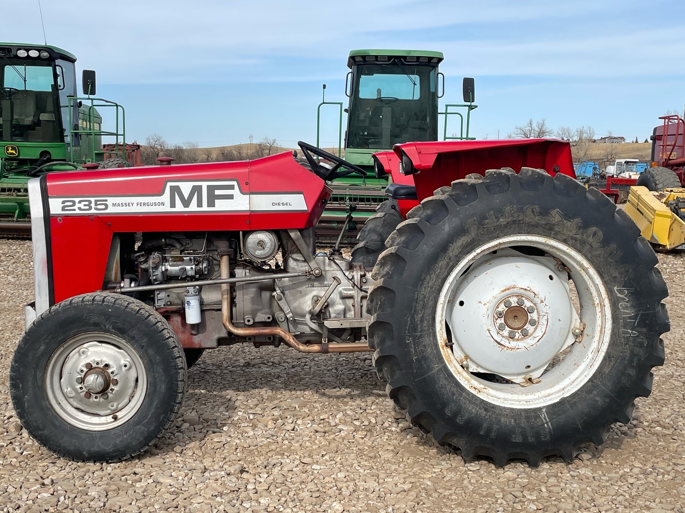 American Ag Video Auction | Lot 2130-100 - '76 MF 235 Diesel Tractor.